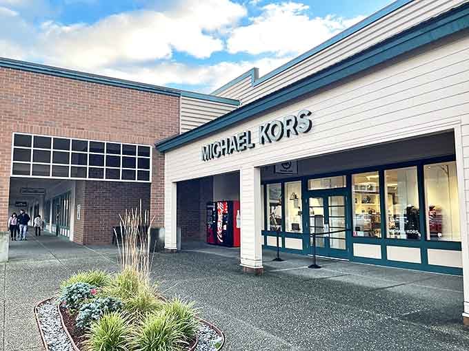 The Michael Kors storefront beckons like a beacon of hope for your fashion dreams and a warning sign for your credit card.