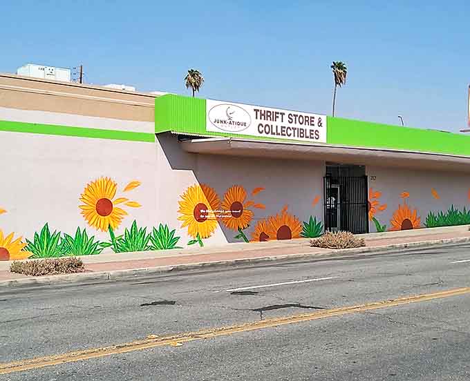 The cheerful sunflower mural outside Junk-Atique isn't just decoration&mdash;it's a promise of the bright treasures waiting inside this Bakersfield bargain paradise.