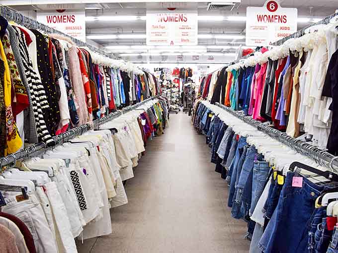 The women's clothing section: where fashion dreams come true without the nightmare price tags. These color-coded racks contain everything from yesterday's trends to tomorrow's vintage finds.