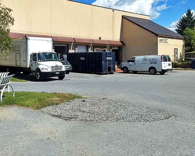 Behind the scenes, ReSOURCE's delivery trucks and donation area reveal the constant flow of new treasures arriving daily.