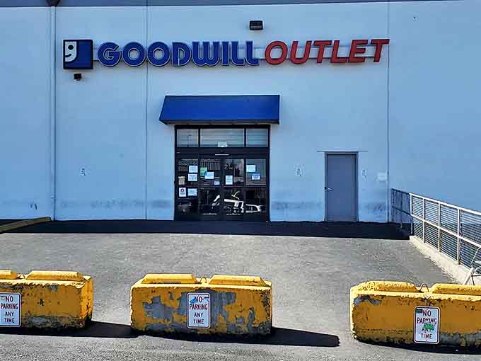 Yellow barriers guard the entrance like bouncers at an exclusive club, except everyone's on the VIP list here.