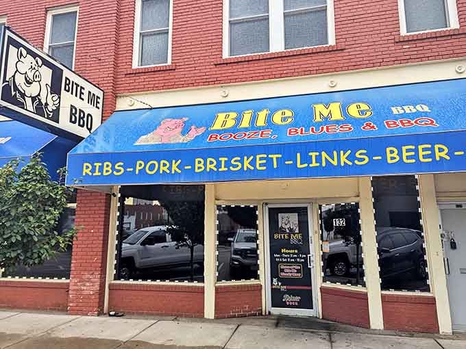The cartoon pig on the sign seems to wink at passersby, as if sharing a delicious secret that waits behind that unassuming door marked "132."
