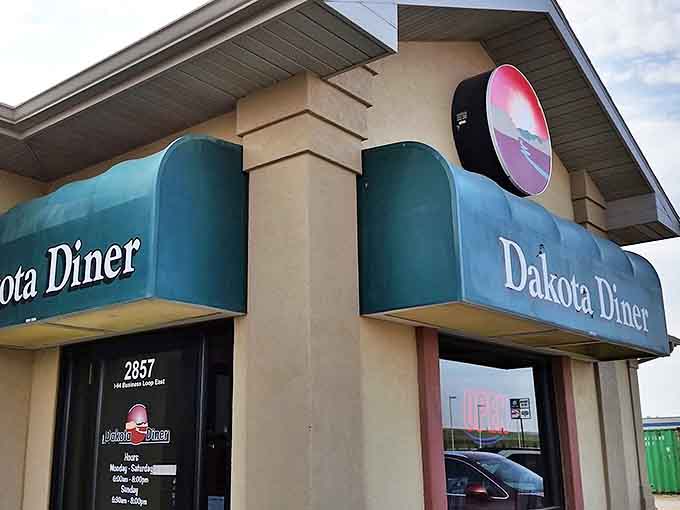 The beige exterior with green awning might not scream "culinary destination," but like your favorite aunt's cooking, what's inside matters most.