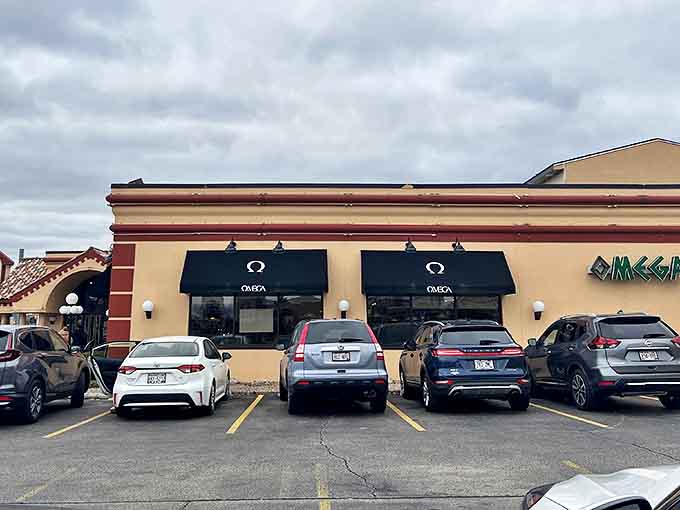 The unassuming exterior of Omega Restaurant hides Milwaukee's breakfast paradise behind those green awnings, like finding a treasure chest in your neighbor's garage.