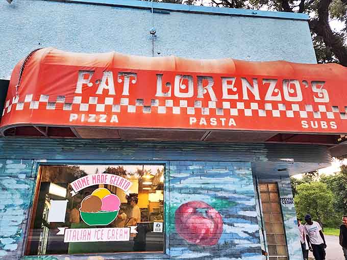 That iconic orange awning against blue walls isn't just eye-catching&mdash;it's a beacon of pizza promise that's been guiding hungry Minneapolitans through snowstorms for decades.