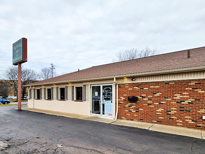 Victoria's unassuming exterior hides culinary treasures within, like finding a Picasso at a yard sale. Brick, beige, and delicious promises await.