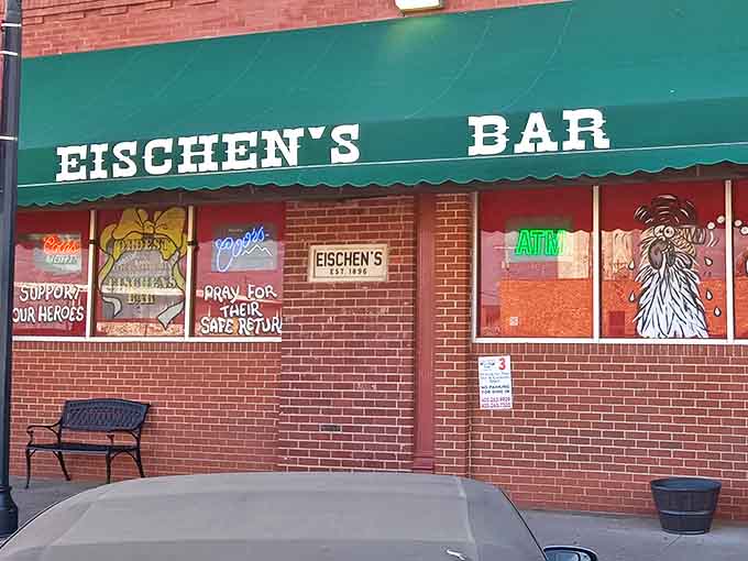 That green awning isn't just decoration&mdash;it's a portal to Oklahoma's oldest bar, where neon beer signs promise cold refreshment alongside legendary poultry.