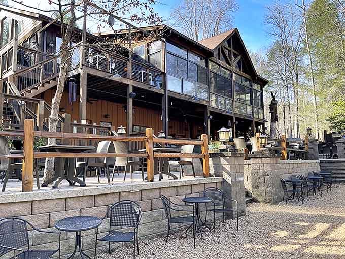 The restaurant&rsquo;s architectural bones take center stage, with multi-level outdoor seating promising al fresco dining. The forest backdrop completes this mountain dining postcard.