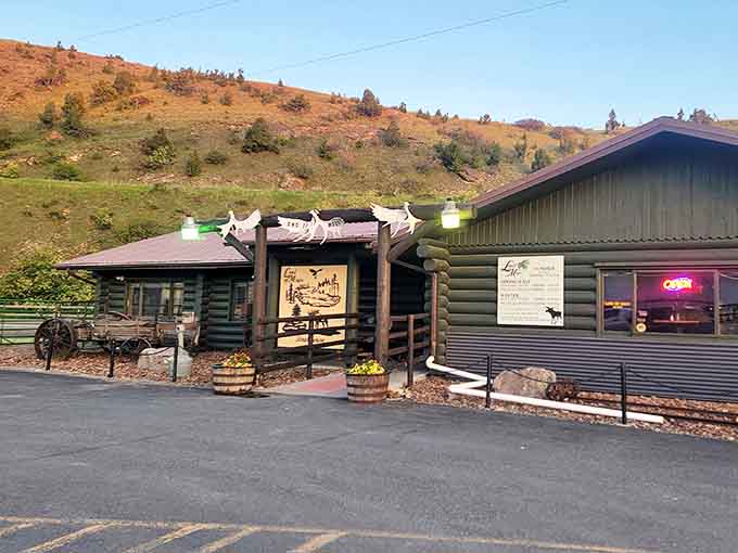 Where Montana magic happens! This rustic log cabin steakhouse nestled against golden hills promises the kind of authentic Western experience that chain restaurants spend millions trying to replicate.