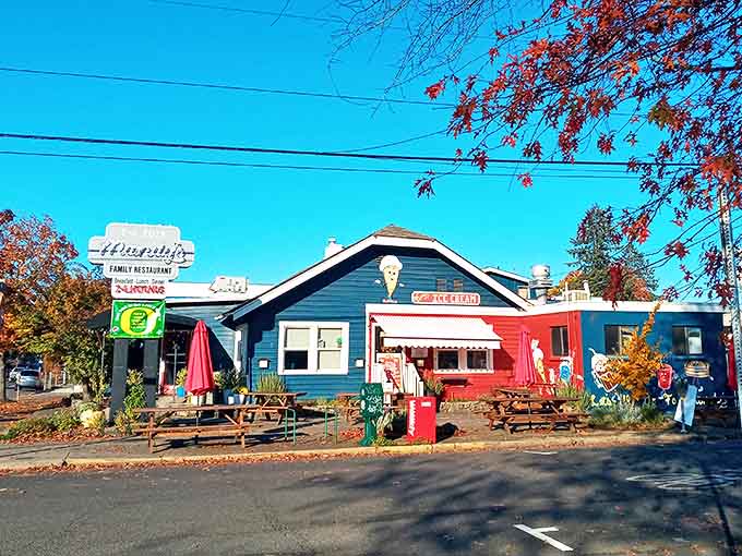 Framed by autumn foliage, Mandy's Family Restaurant's inviting blue building and picnic tables create the perfect neighborhood breakfast spot.