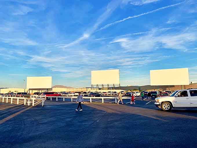 Three massive screens await under that impossibly blue Nevada sky. Cinema's original big-screen experience still feels magical in the desert light.