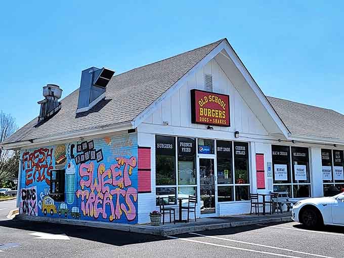 Daylight reveals the full character of this burger sanctuary, where the vibrant street art mural whispers of the creativity waiting inside your next meal.