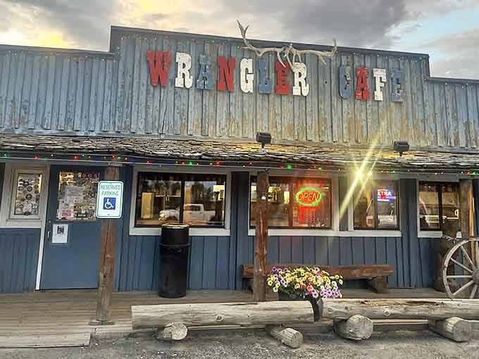 The Wrangler Cafe's weathered blue exterior isn't trying to impress anyone, which is exactly why it impresses everyone who visits this Pinedale institution.