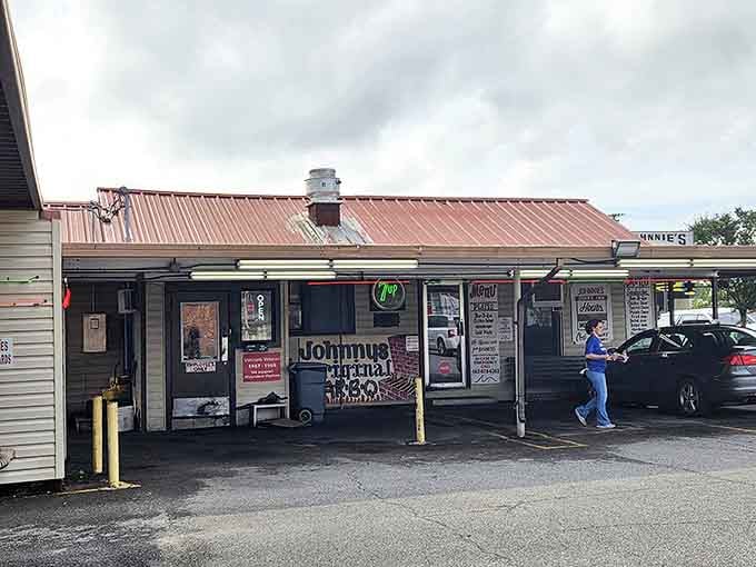 The weathered metal roof and humble facade of Johnnie's Drive In tell you everything you need to know&mdash;this place doesn't need fancy frills when the food speaks volumes.