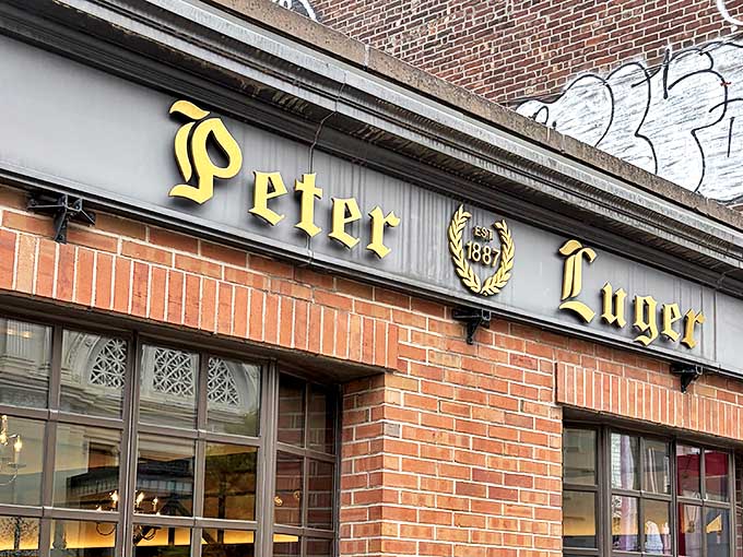 The iconic gold lettering against brick announces Peter Luger like a culinary bat signal to steak lovers across New York. Simplicity that speaks volumes.