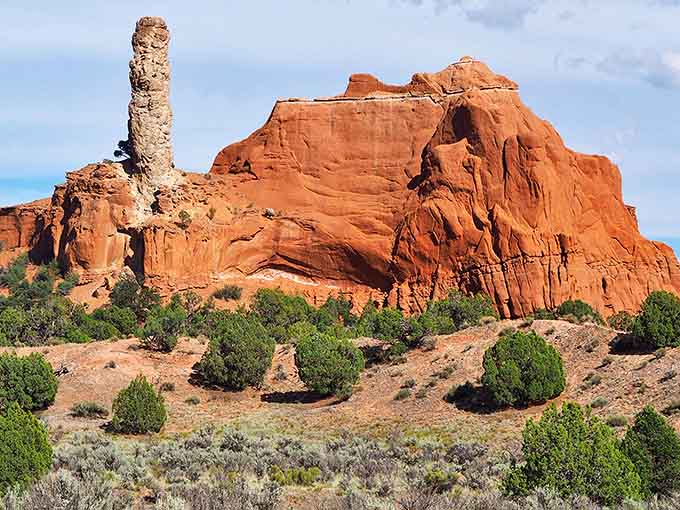 This towering sentinel stands guard over the basin, a geological celebrity that's been perfecting its pose for millions of years.