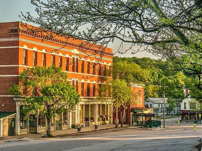 Historic brick buildings stand sentinel along Brandon's main street, their warm hues glowing in the afternoon light like a Vermont postcard come to life.