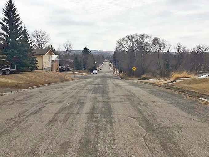 Beulah's residential streets stretch toward the horizon, where the road seems to dissolve into prairie and possibility.