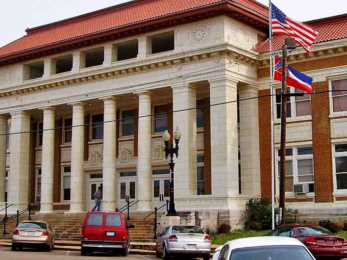 The stately Pontotoc courthouse stands as a testament to small-town grandeur, its columns and red roof creating an architectural exclamation point downtown.