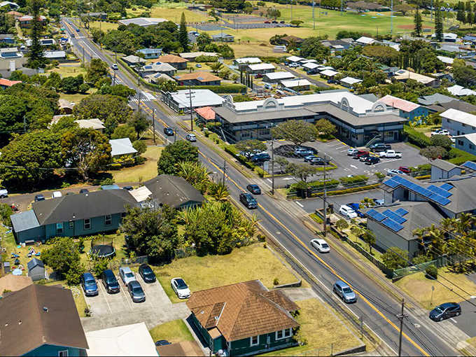 This aerial view captures Makawao's perfect blend of rural charm and small-town convenience, with its tidy streets and surrounding greenery.