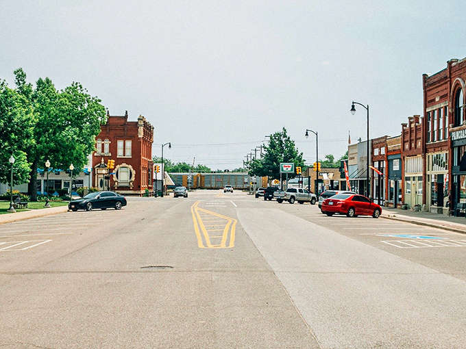 Main Street stretches toward the horizon like a scene from a nostalgic film, where small-town America still thrives in all its brick-and-mortar glory.