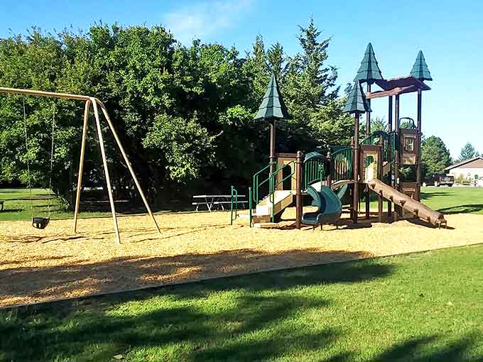 Not just any playground&mdash;this woodland castle offers the universal childhood joy of conquering slides while parents enjoy nearby shade.