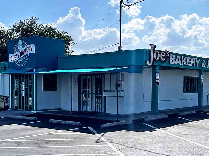 The turquoise-trimmed exterior of Joe's Bakery stands like a beacon of culinary promise on East 7th Street, beckoning hungry Austinites with its no-frills charm.