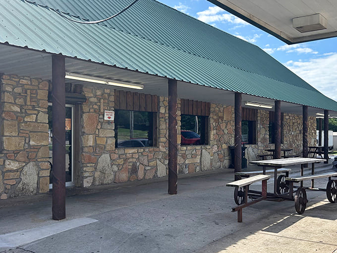 Stone walls and outdoor seating welcome visitors to this Oklahoma institution where generations have stopped for hand-crafted fried pies since 1954.