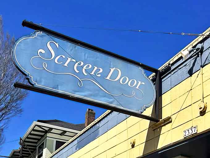 The iconic blue Screen Door sign against Portland's sky promises Southern comfort that's worth every minute you'll spend in line.