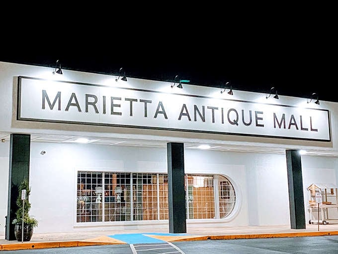 Even at night, the Marietta Antique Mall beckons collectors with its siren song of vintage treasures and forgotten heirlooms.