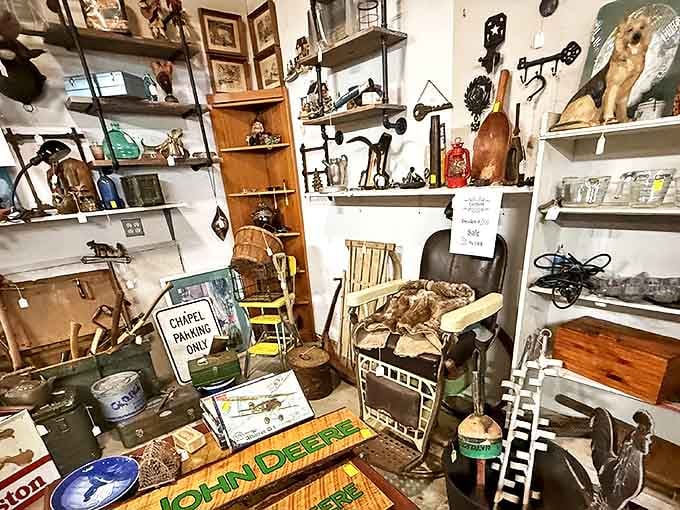 This booth is what happens when history throws a party and invites all its favorite artifacts. That "Chapel Parking Only" sign? Divine intervention for collectors.