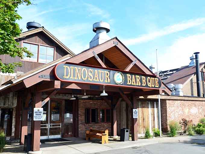 The rustic wooden facade of Dinosaur Bar-B-Que welcomes hungry travelers like a barbecue beacon on the Hudson. No fancy frills, just the promise of smoky delights within.