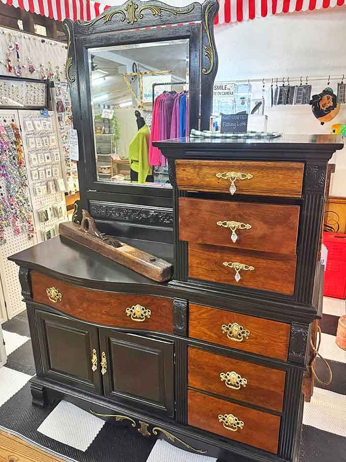 This antique dresser with mirror isn't furniture&mdash;it's a time machine to morning routines from a century ago, brass hardware included.