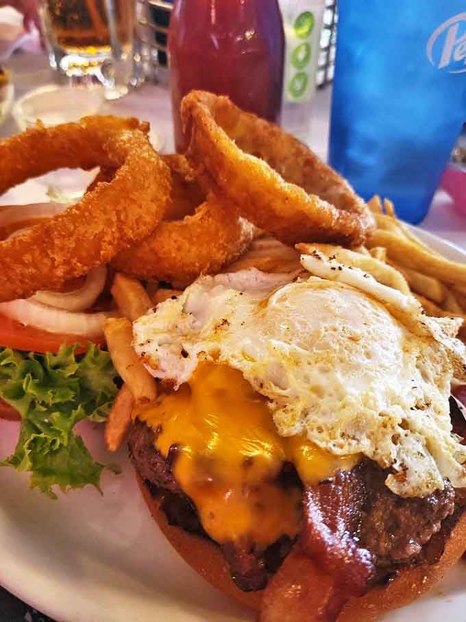 A burger topped with a sunny-side-up egg &ndash; because sometimes breakfast and lunch need to stop fighting and just get along.