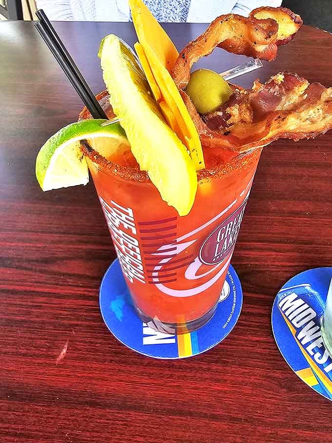This isn't just a Bloody Mary&mdash;it's a liquid brunch with enough garnishes to count as a side salad. The bacon strip is basically a meat exclamation point.