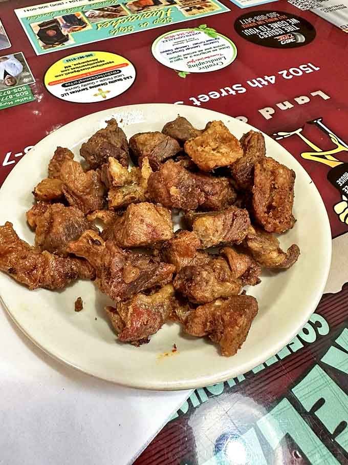 These golden-brown chicharrones aren't just fried pork&mdash;they're crunchy little morsels of happiness that could make even the most dedicated health nut reconsider their life choices.