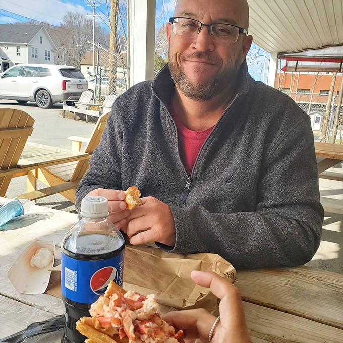 Nothing says "authentic Maine experience" like enjoying a lobster roll at a picnic table with a cold Pepsi.