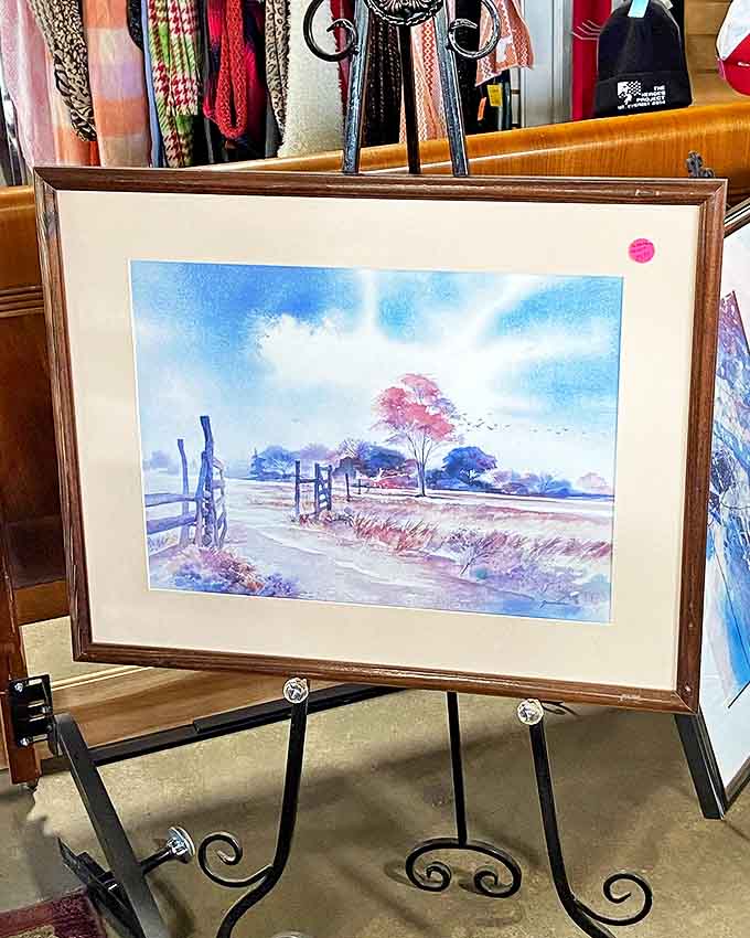 A watercolor landscape waiting for the perfect wall space. Art that costs less than the frame it's sitting in is thrifting at its finest.
