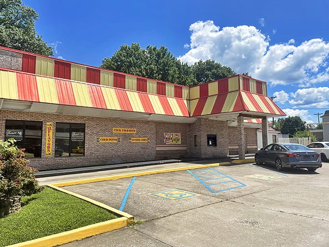 Gino's distinctive red-and-yellow awning signals comfort food that satisfies both your appetite and your budget constraints.
