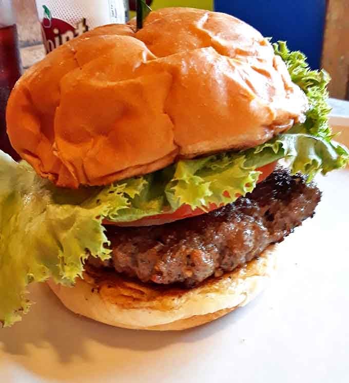 This isn't some fancy gastropub creation – it's an honest-to-goodness diner burger that reminds you why classics became classics.