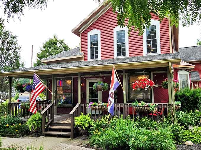 The Herrick House welcomes visitors with wraparound porch perfection and flower displays that would make any gardening show host jealous.