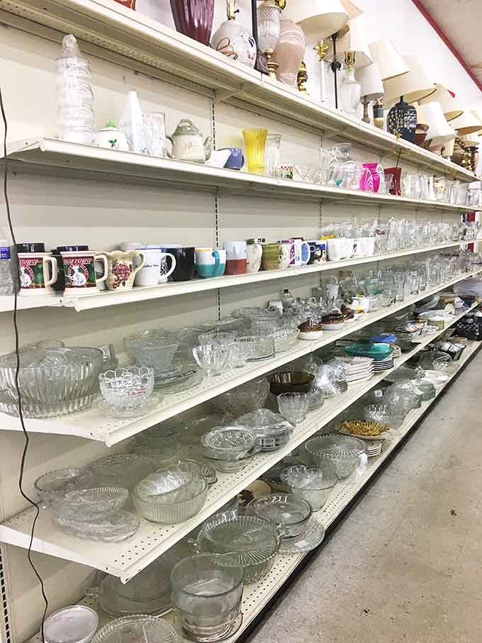 Crystal bowls and coffee mugs coexist in perfect harmony, waiting to grace tables from modest apartments to suburban dining rooms.