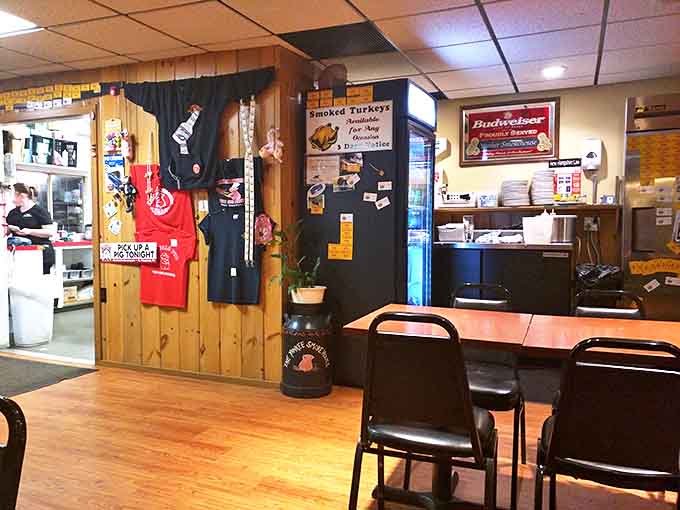 Wood paneling, merchandise, and the siren call of smoked meats &ndash; the BBQ joint decor trifecta that signals authentic goodness ahead.