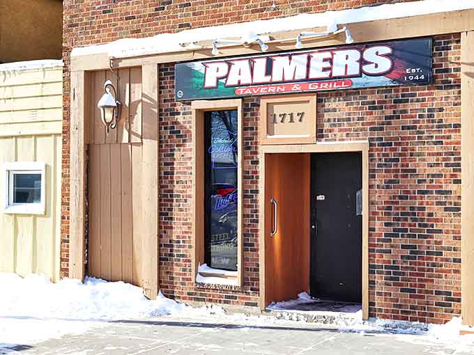 Palmer's Tavern stands as a testament to Minnesota resilience, its brick exterior weathering decades of brutal winters while keeping spirits warm inside.