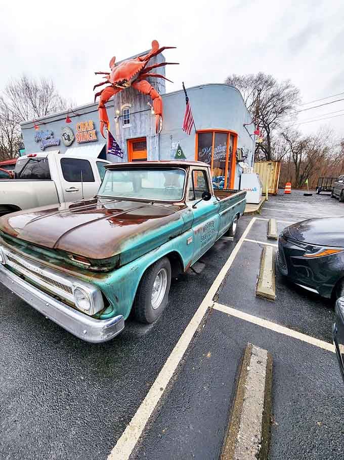 The vintage truck outside says, "We've been in the seafood game longer than you've been eating solid food." That giant crab agrees.