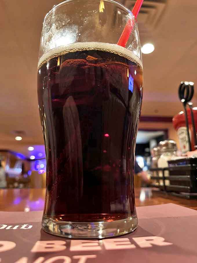 A frosty glass of root beer – because sometimes the perfect beverage isn't alcoholic, even in Sin City. Sweet, spicy, and nostalgic.