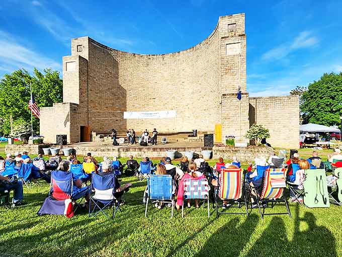 The Roxbury Bandshell's curved wall creates a perfect acoustic embrace for summer concerts where lawn chairs and good vibes are the only admission requirements.