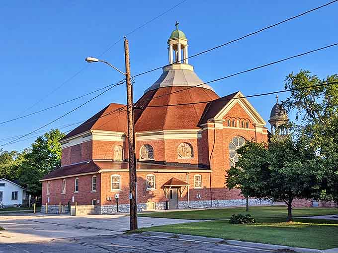 St. Joseph's Catholic Church stands as an architectural exclamation point downtown—its copper dome catching sunset light like it's showing off for photographers.