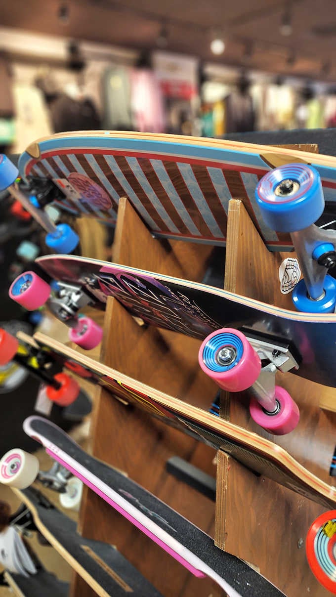 Skateboards lined up like colorful surfboards, bringing coastal cool to concrete adventures at prices that won't wipe out your wallet.