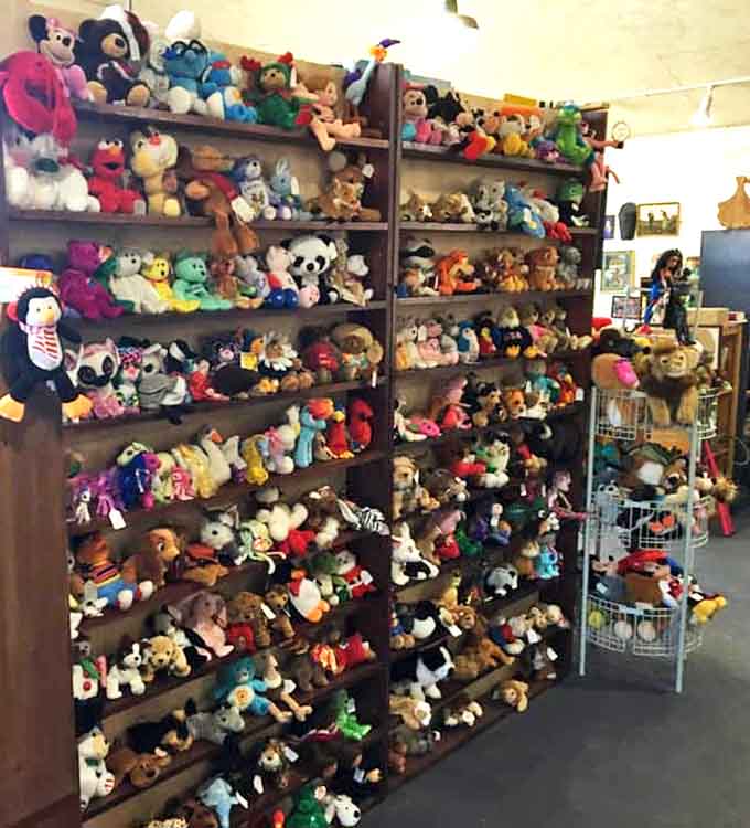 Stuffed animal paradise where childhood memories stand at attention. This isn't just a collection; it's a fuzzy, huggable army waiting for their forever homes.